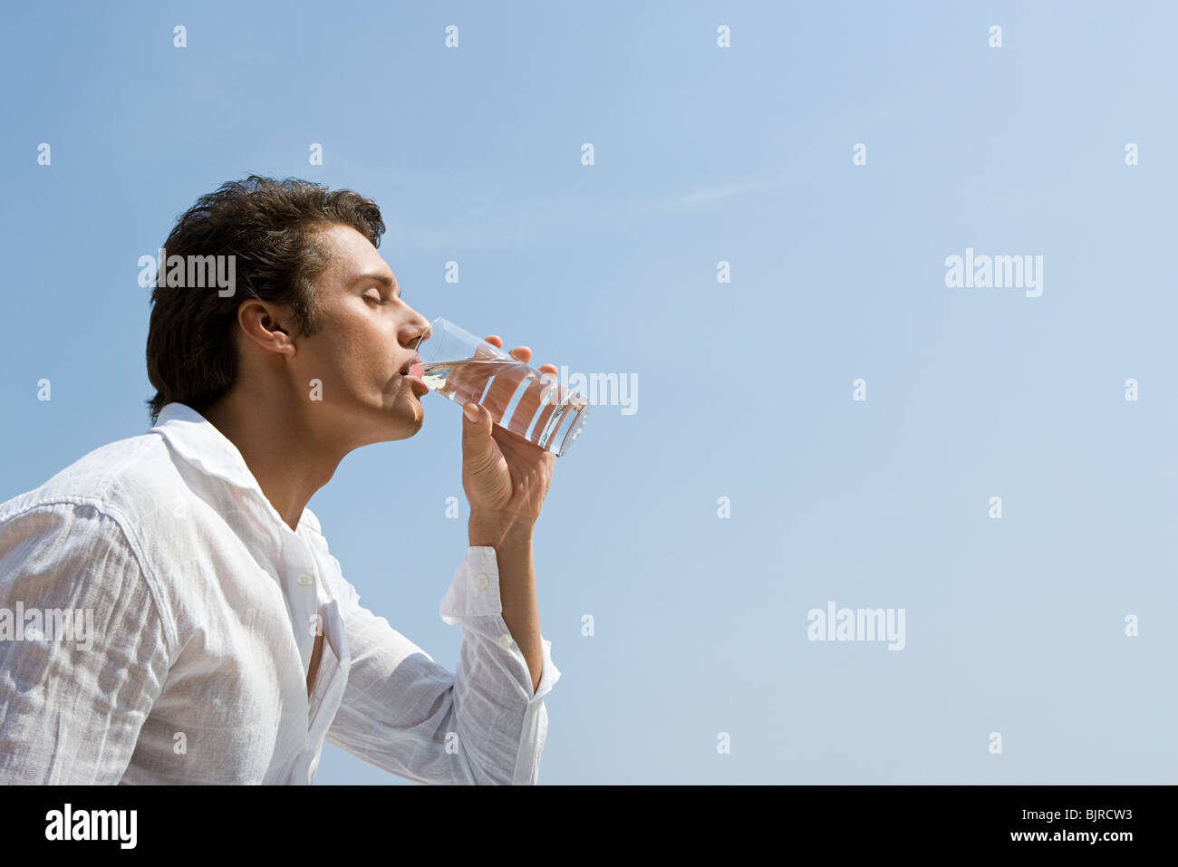Man drinking water Stock Photo - Alamy