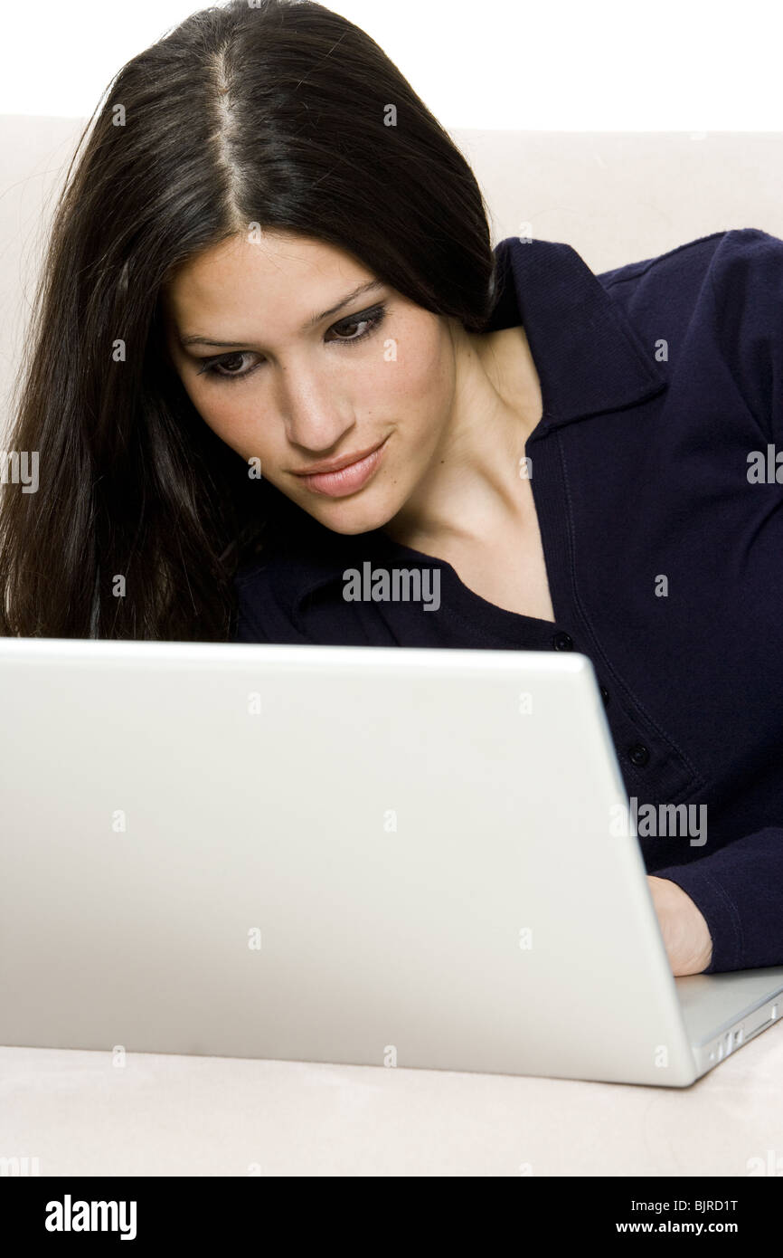 Woman working on laptop Stock Photo - Alamy