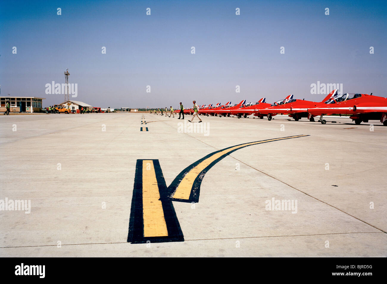 Members of the Red Arrows aerobatic team's ground crew step away in ...