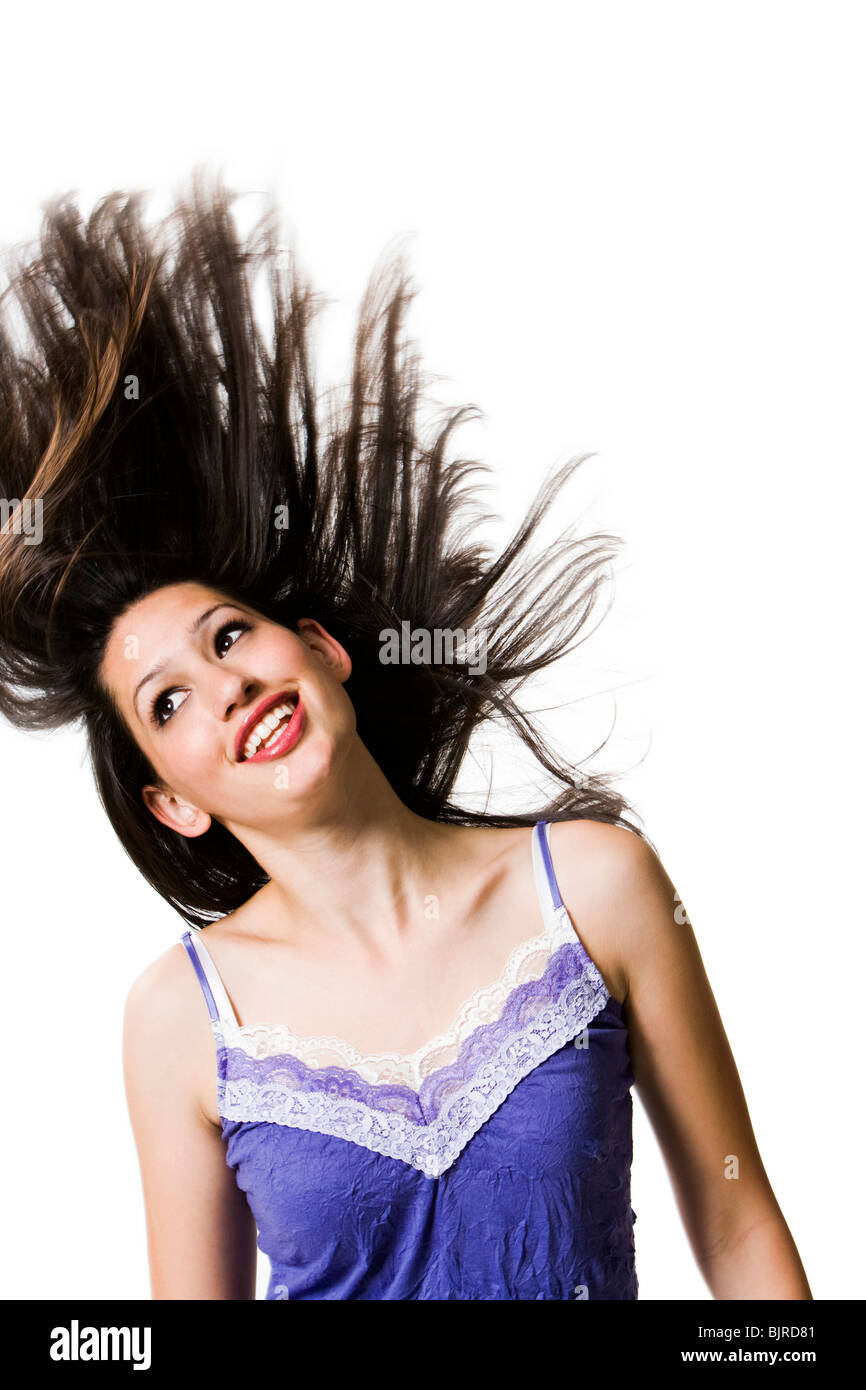 Woman tossing hair Stock Photo - Alamy