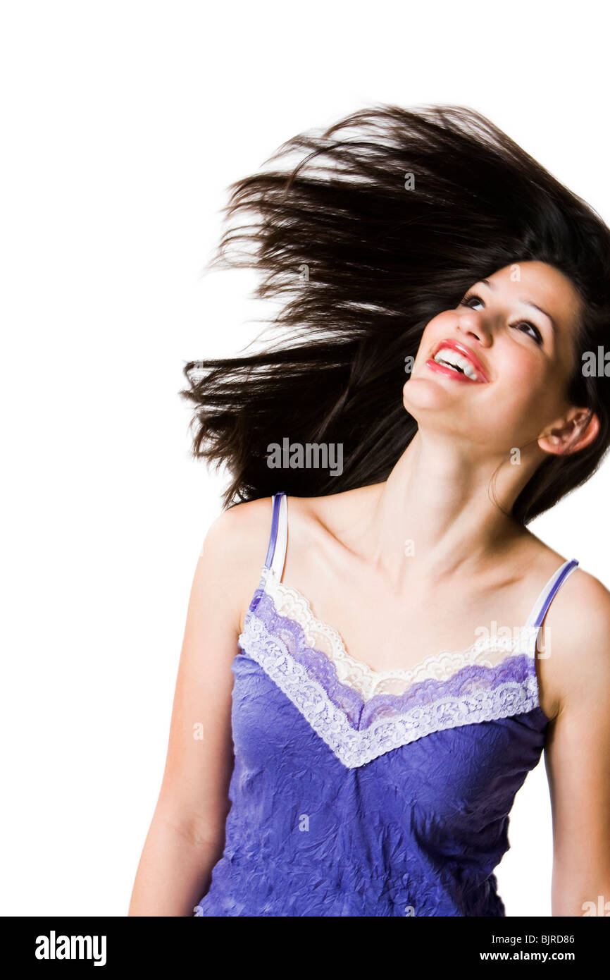 Woman tossing hair Stock Photo - Alamy