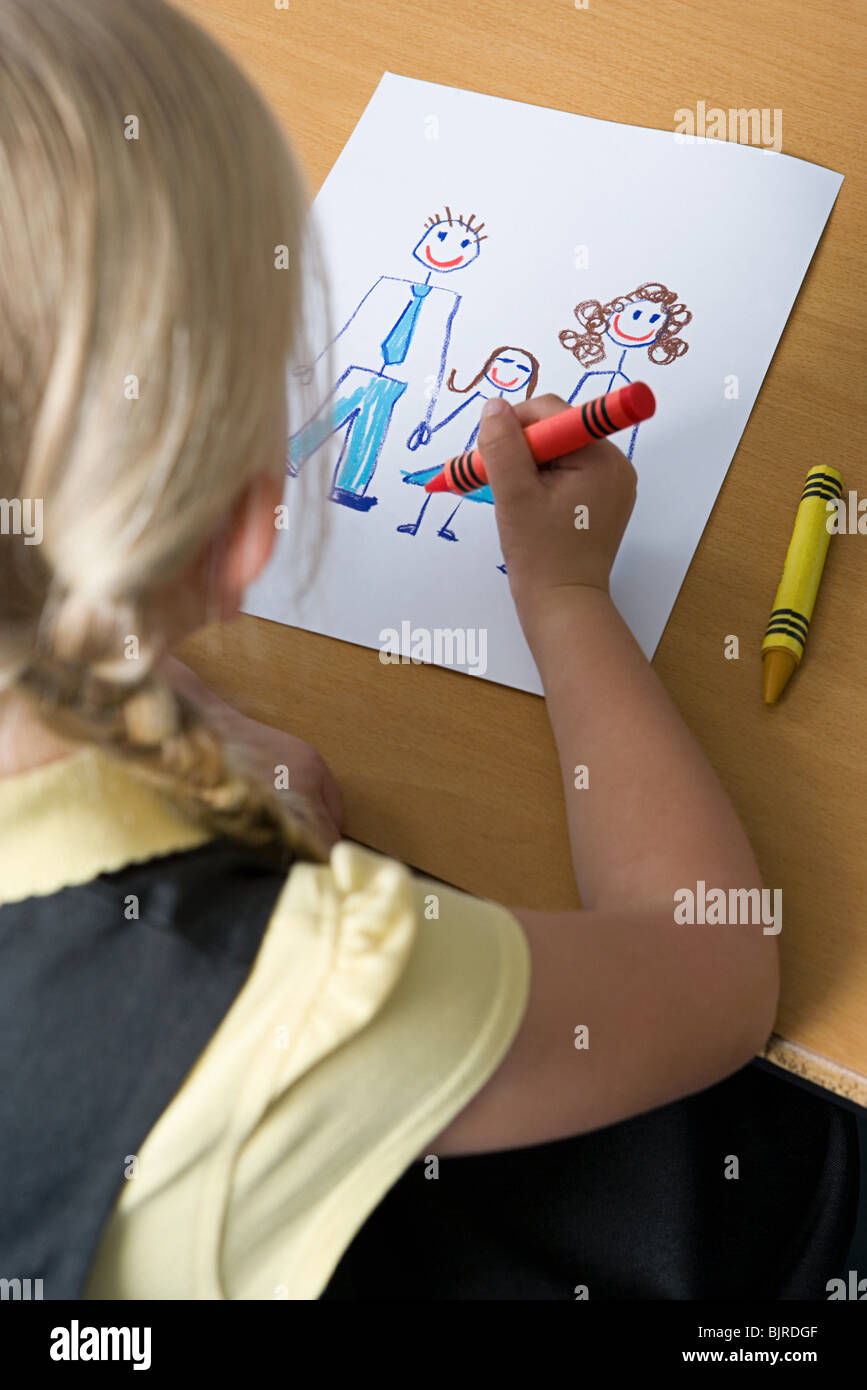 Girl drawing family Stock Photo - Alamy