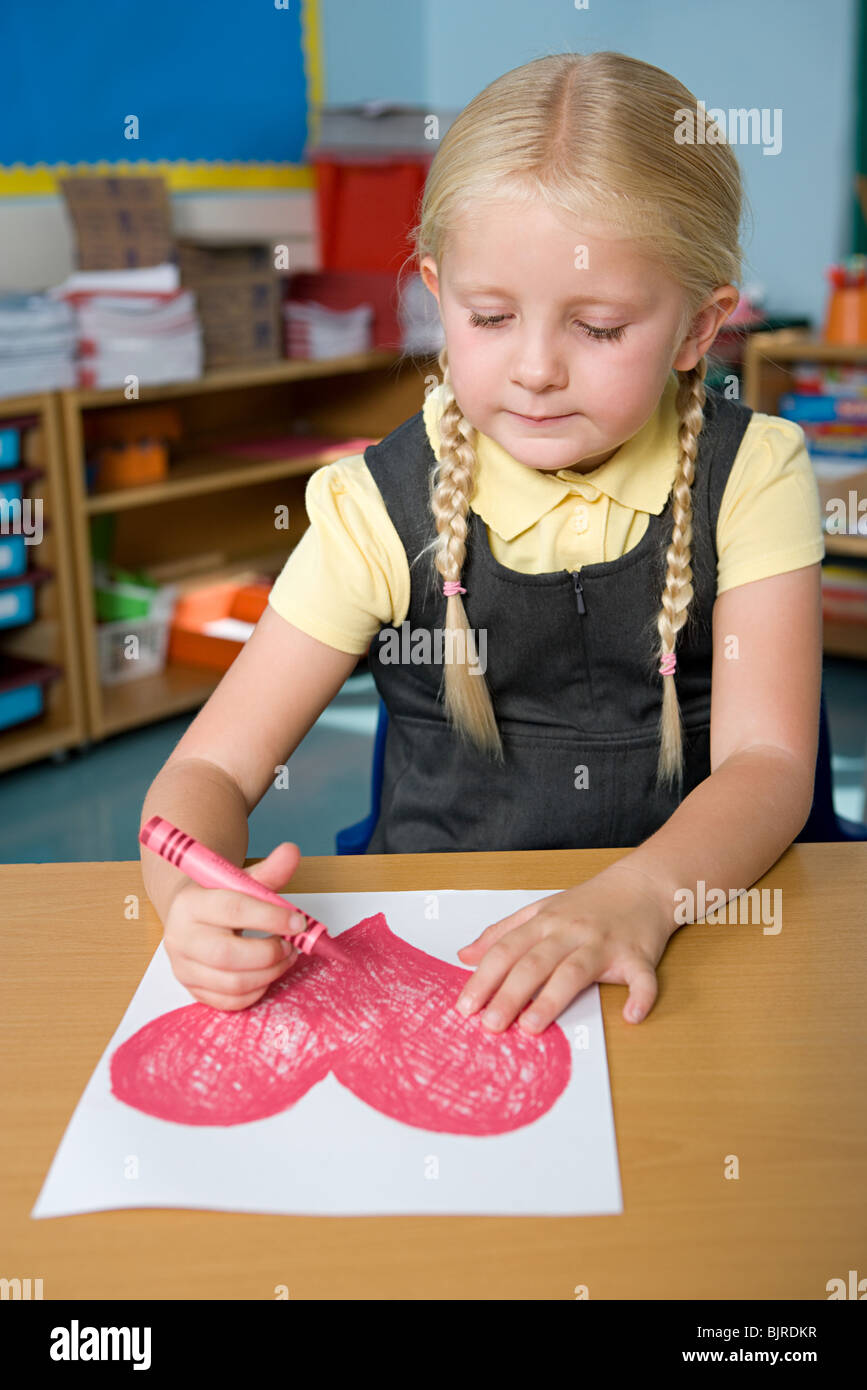 Girl drawing picture Stock Photo - Alamy