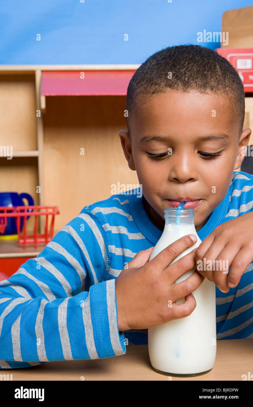 Boy drinking milk Stock Photo - Alamy