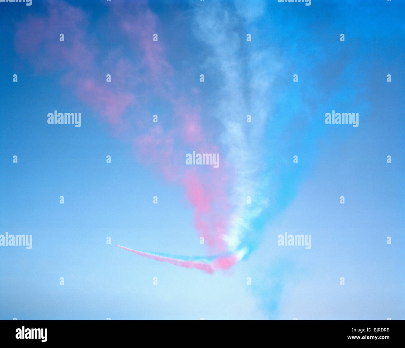 Dissipating red, white and blue vapour trails from the Red Arrows ...