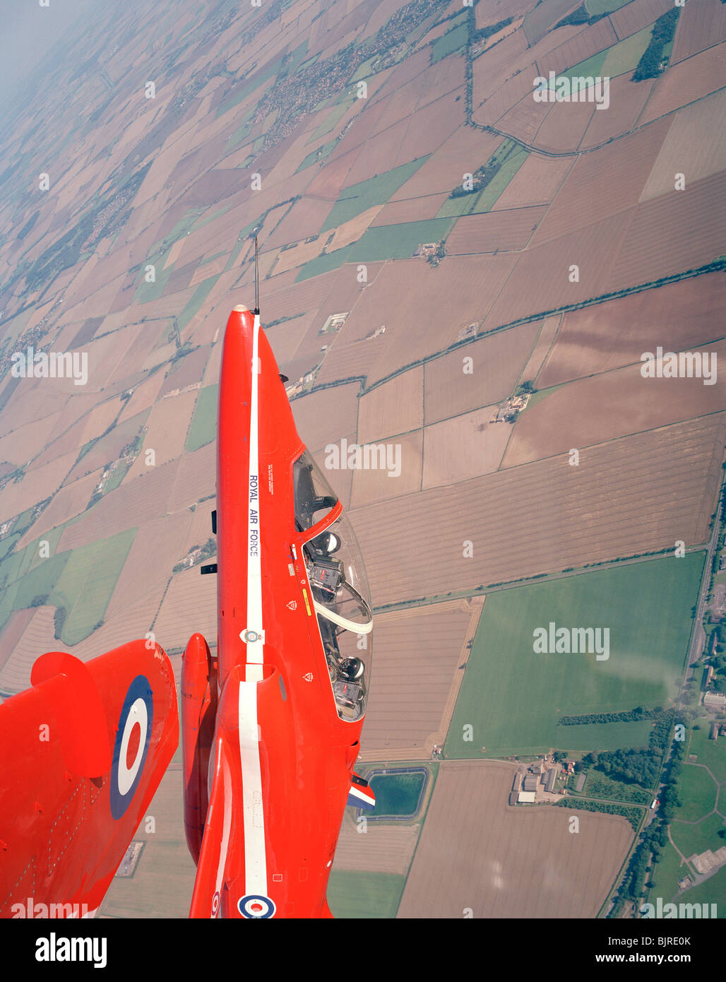 Two Red Arrows Hawks climb and loop vertically at sub-sonic speeds ...