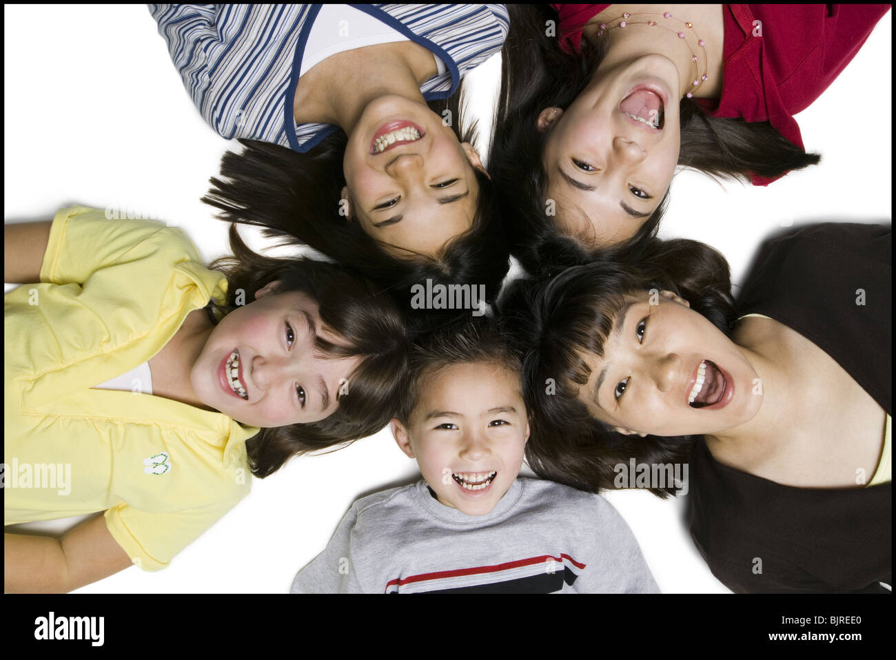 Five children laughing Stock Photo - Alamy