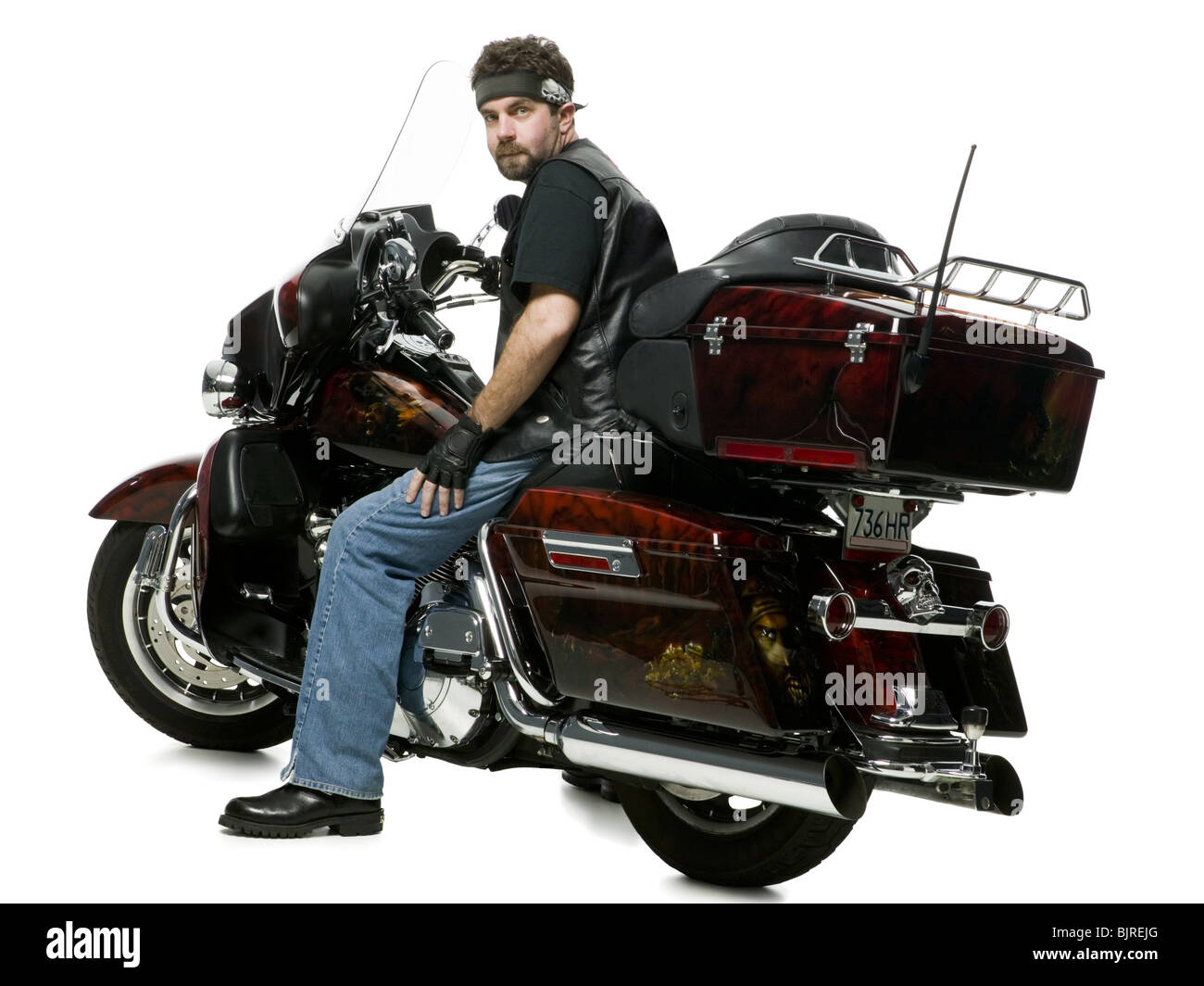 Man posing on motorcycle Stock Photo - Alamy