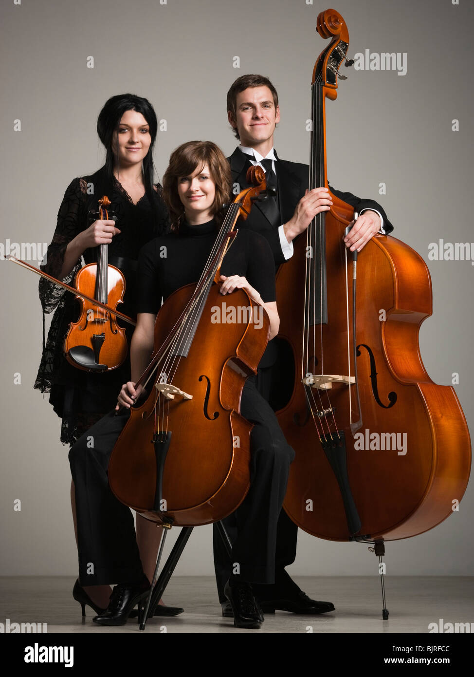 Women and men with instruments hi-res stock photography and images - Alamy