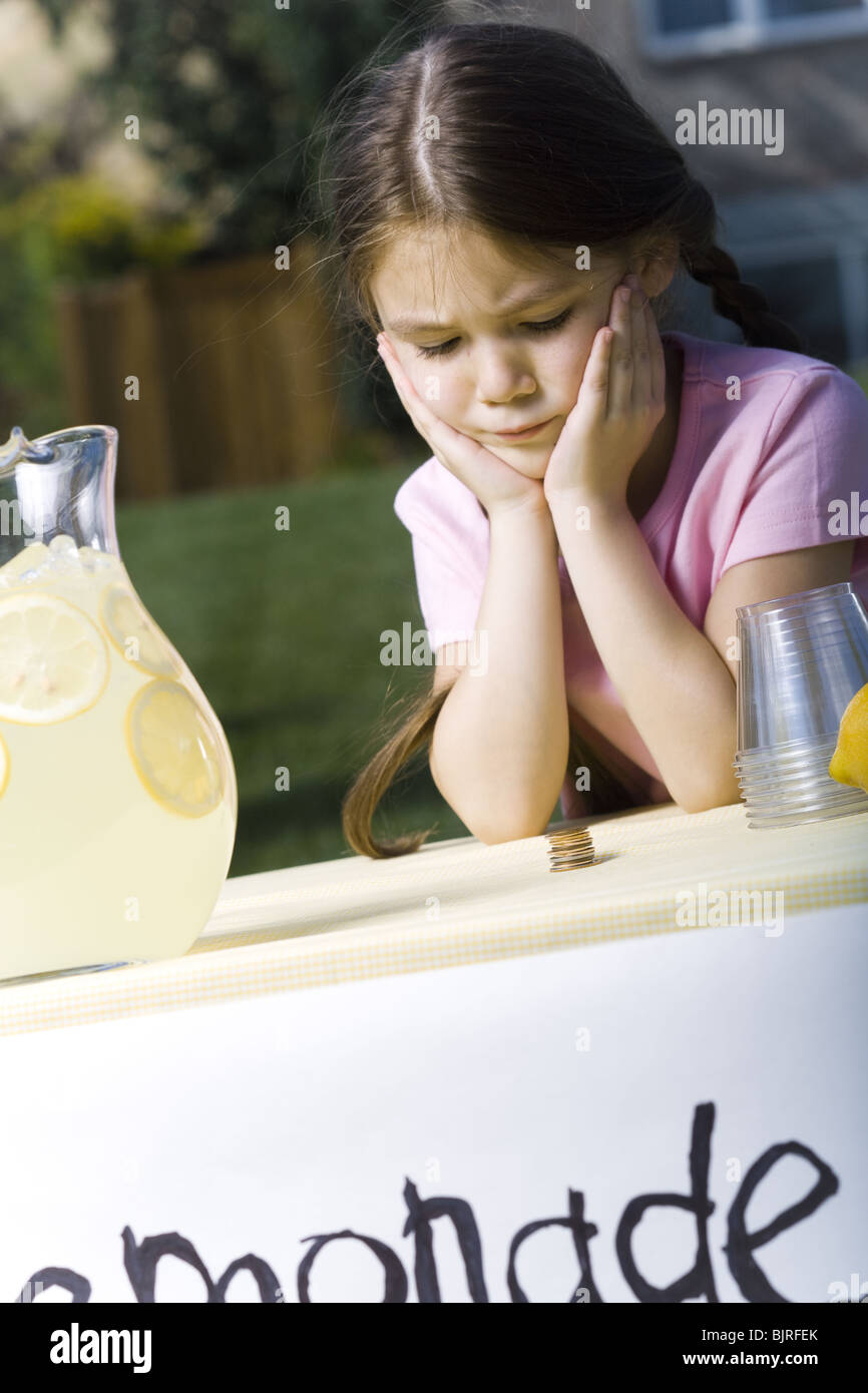 Girl selling lemonade Stock Photo - Alamy