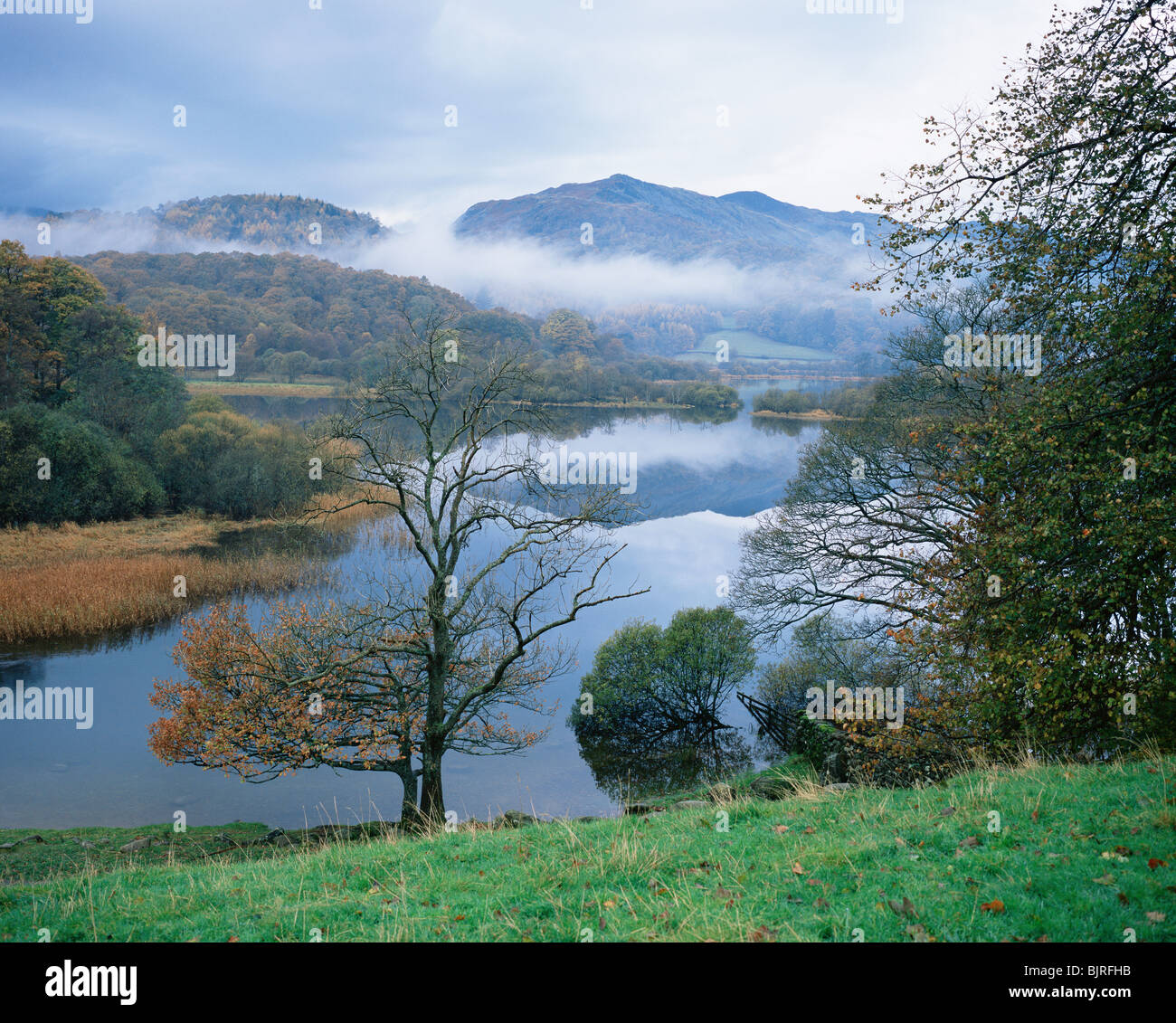 Mist over cumbrian lake Stock Photo - Alamy