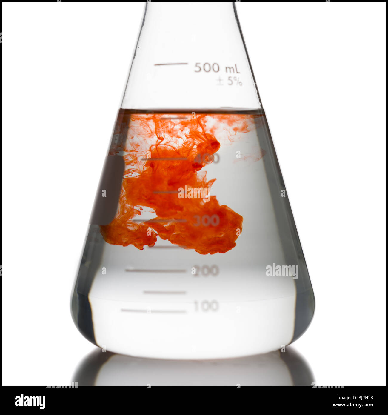 Flask with chemicals in it Stock Photo - Alamy