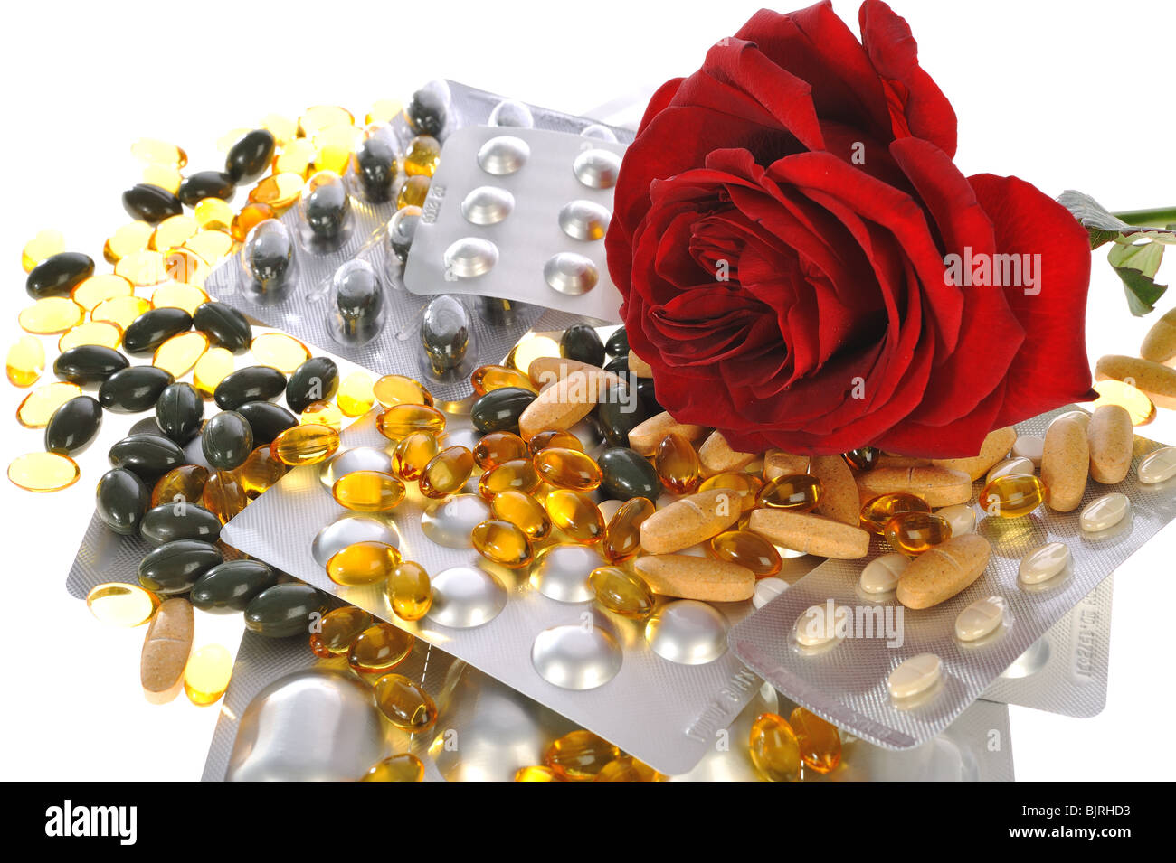 pills and rose Stock Photo - Alamy
