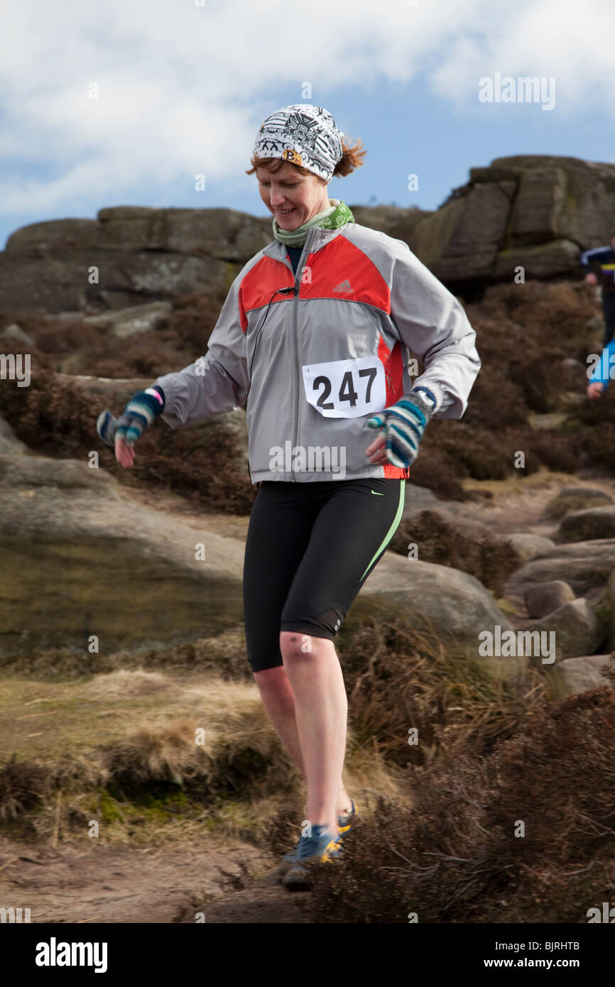Female Marathon runner in the Peak District National Park Derbyshire ...