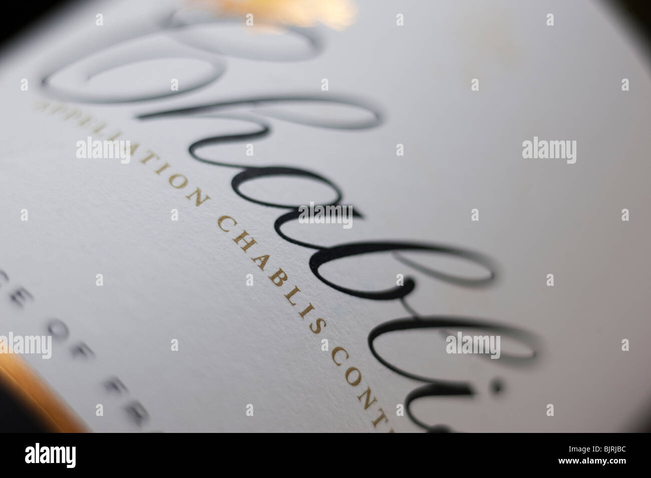Chablis wine bottle label closeup Stock Photo - Alamy