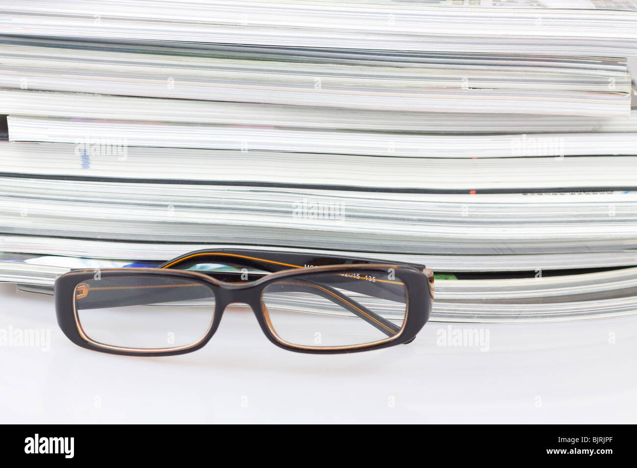 Glasses and books Stock Photo - Alamy