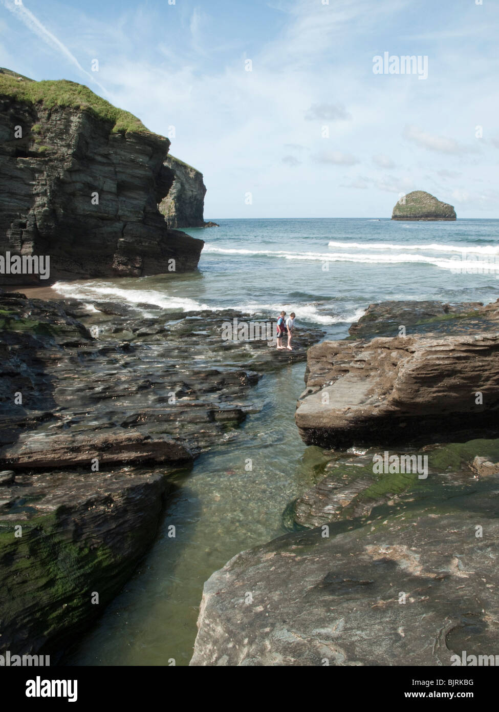 Trebarwith Strand, North Cornwall, UK. View of the beach with Gull Rock ...