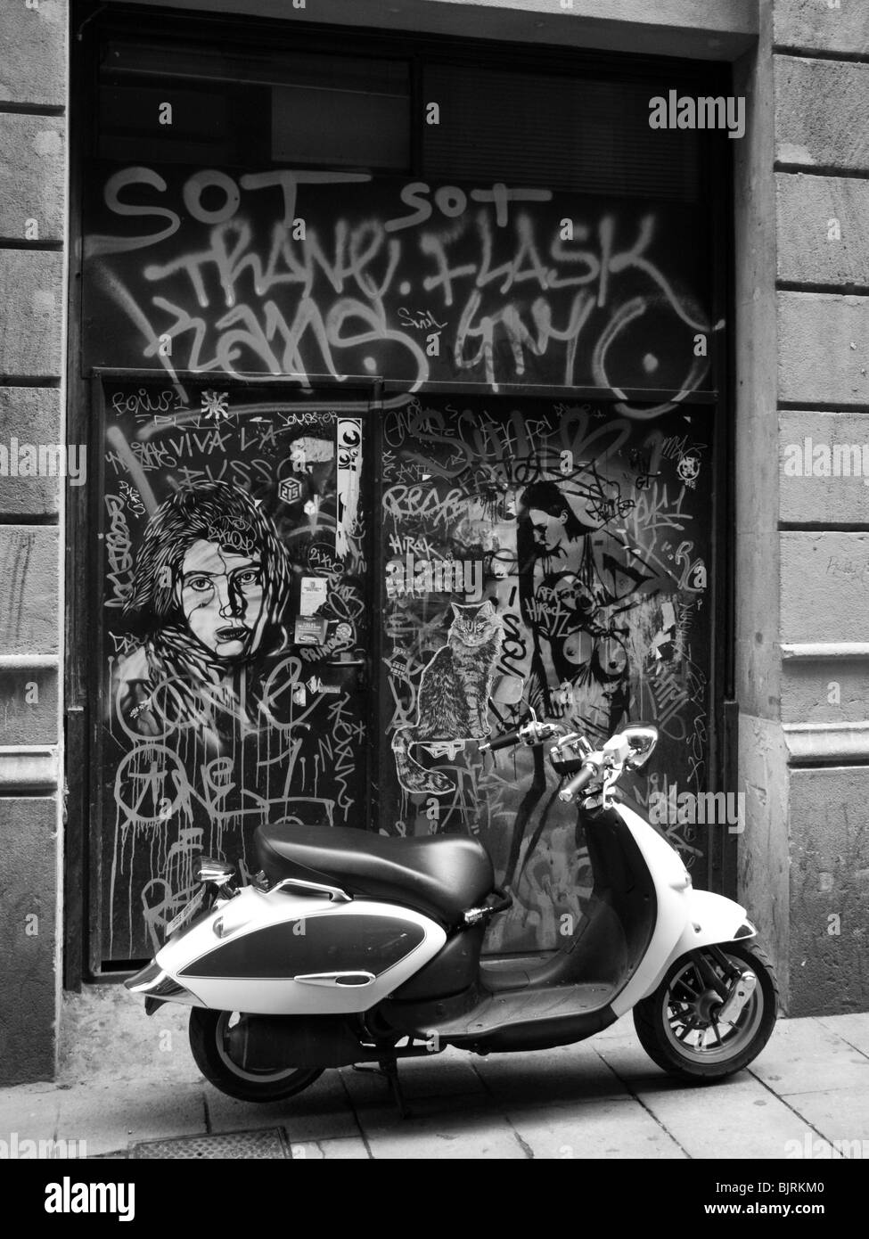 Barcelona, Spain. Moped scooter in front of graffiti Stock Photo - Alamy