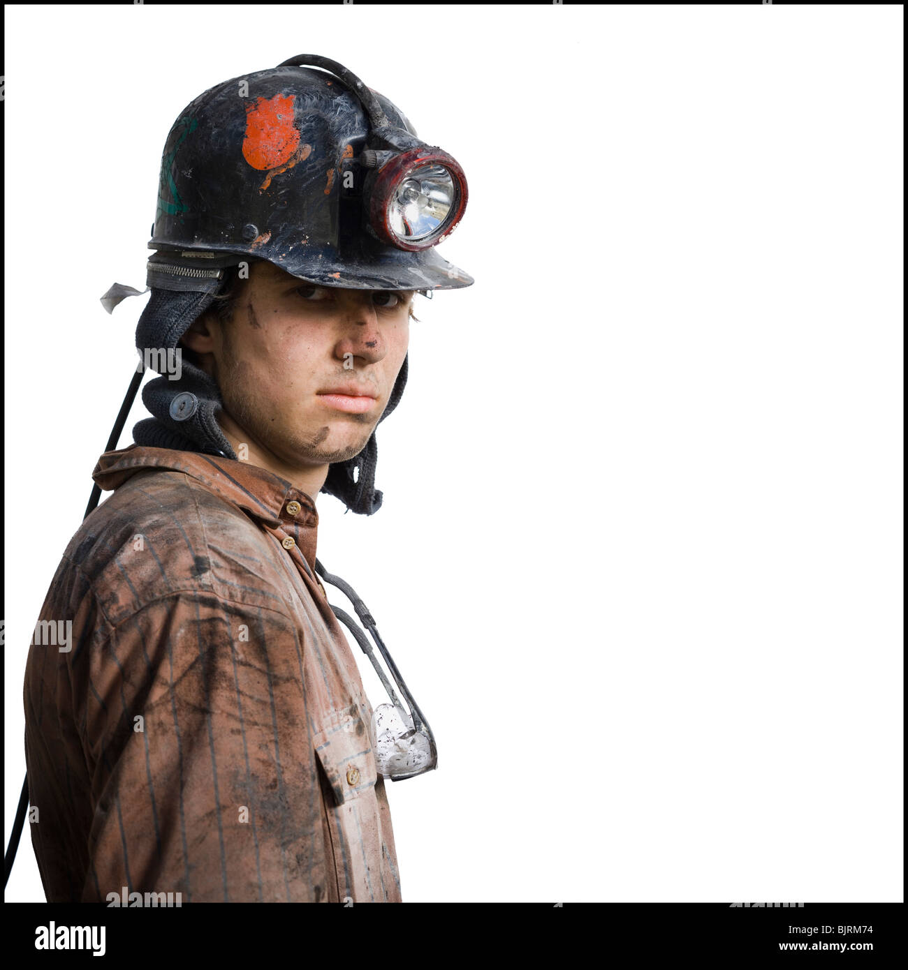Mine worker with flashlight helmet Stock Photo - Alamy