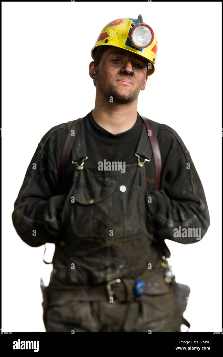 Mine worker with flashlight helmet Stock Photo - Alamy