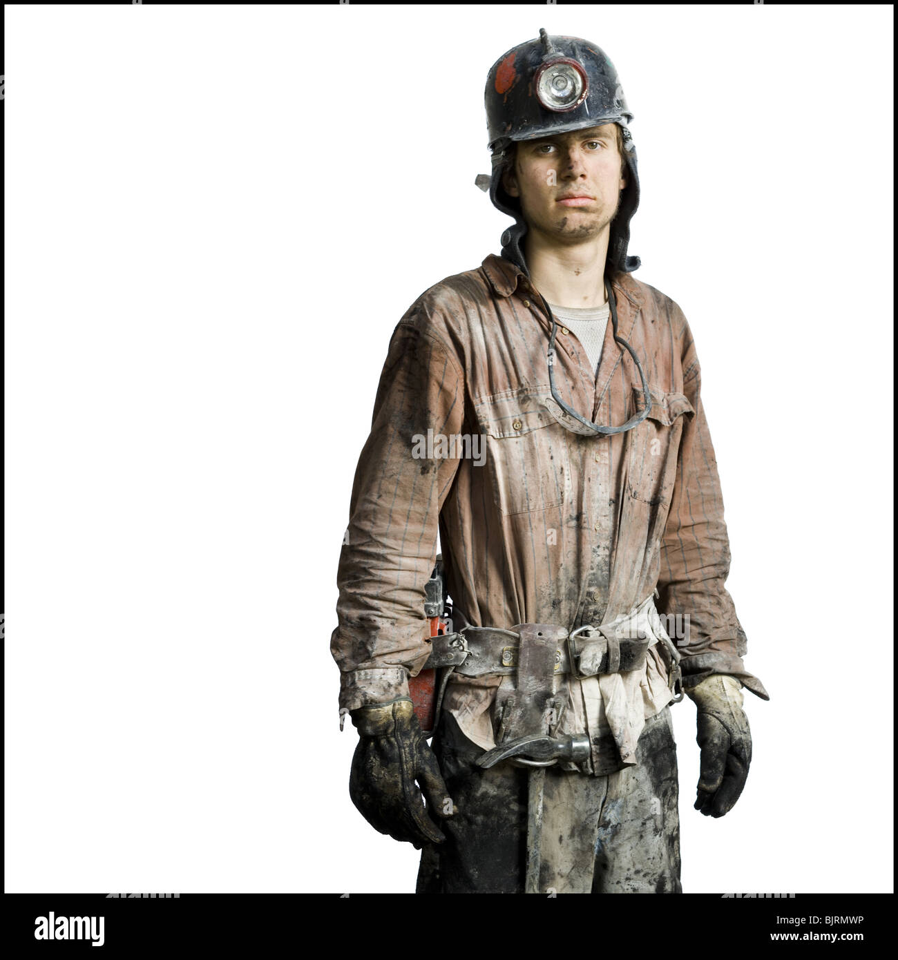 Mine worker with flashlight helmet Stock Photo - Alamy