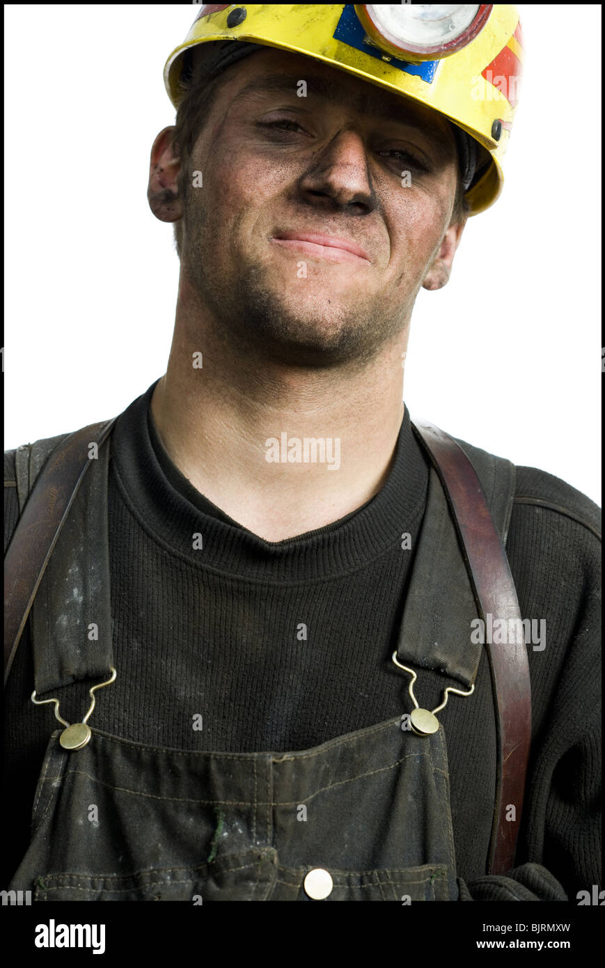 Mine worker with flashlight helmet Stock Photo - Alamy
