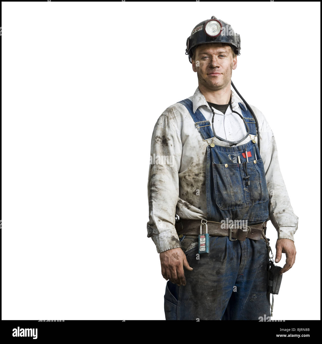 Mine worker with flashlight helmet Stock Photo - Alamy