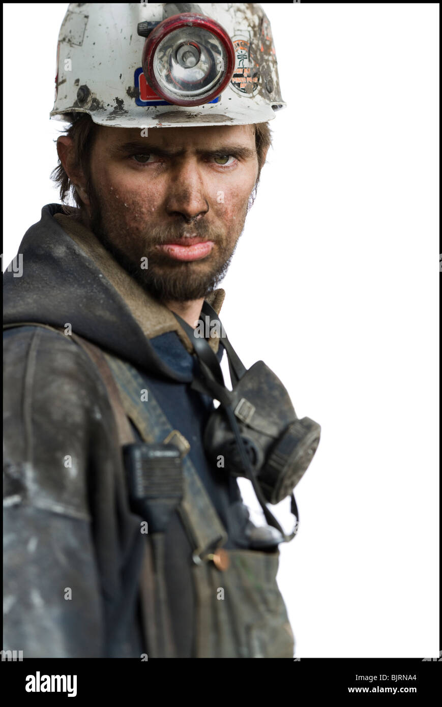 Mine worker with flashlight helmet Stock Photo - Alamy