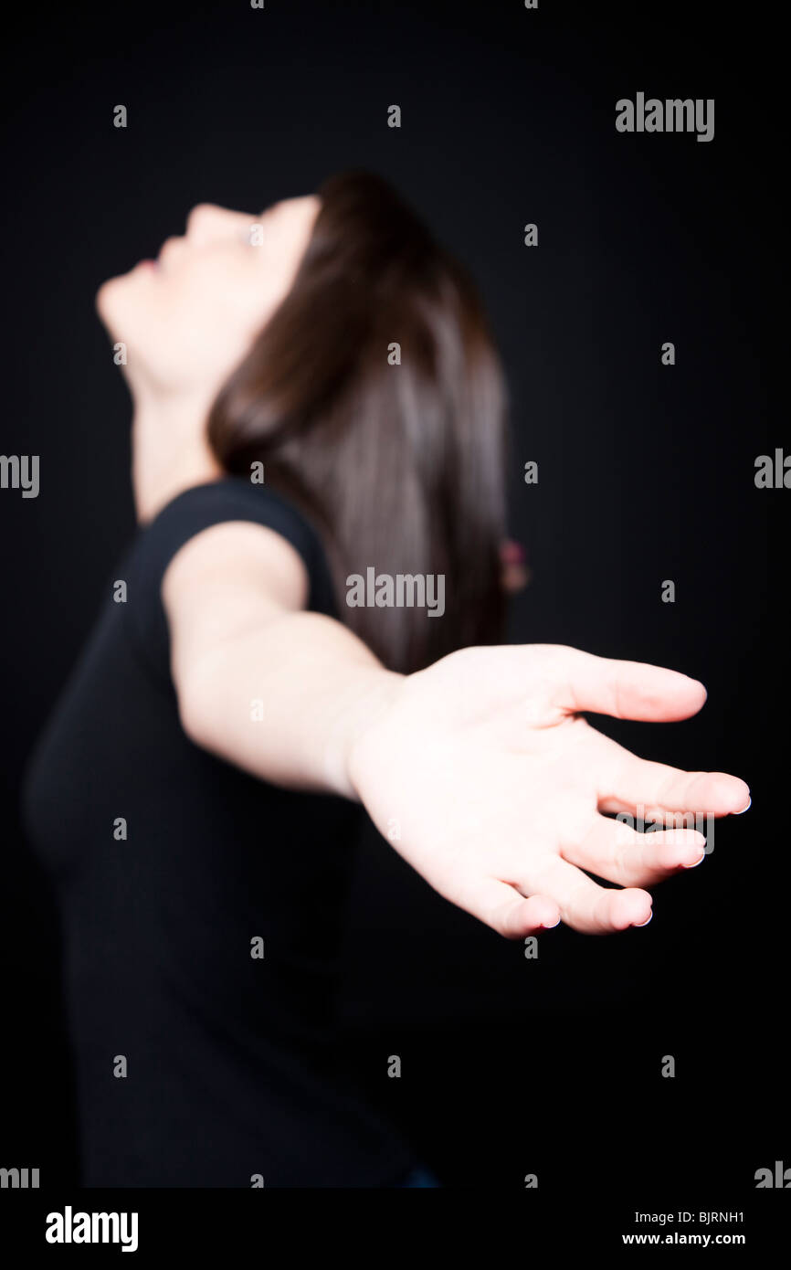 Woman with outstretched arms Stock Photo - Alamy
