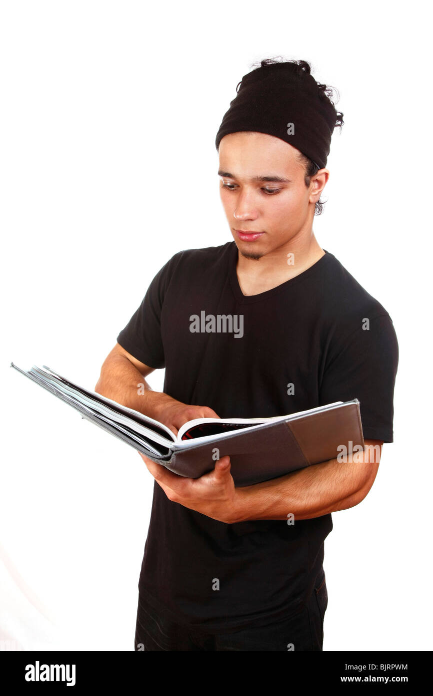 A casual student reading a text on a white background Stock Photo - Alamy