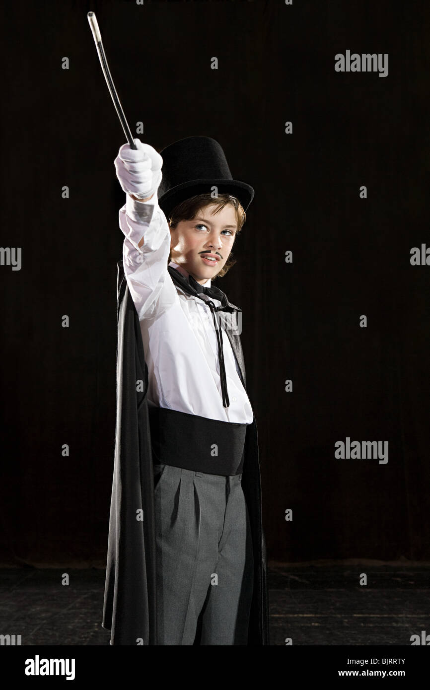 Magician stands hi-res stock photography and images - Alamy