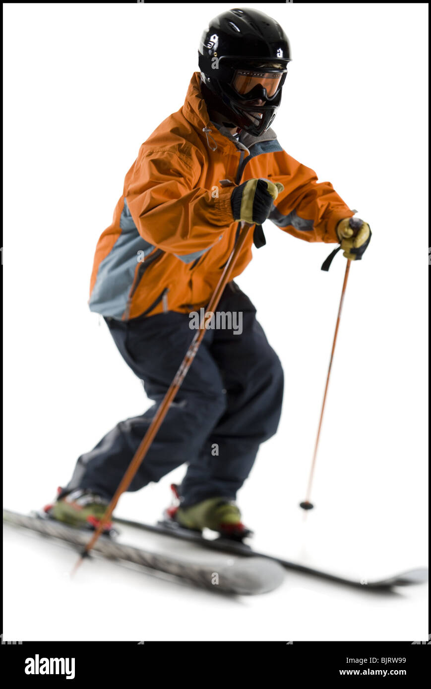 Male skier in orange ski jacket Stock Photo - Alamy