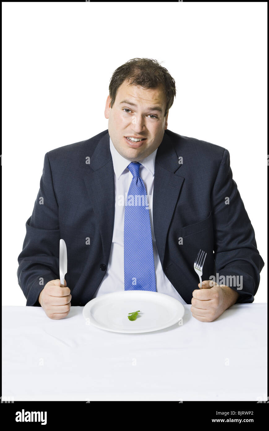 Food eating big small man hi-res stock photography and images - Alamy