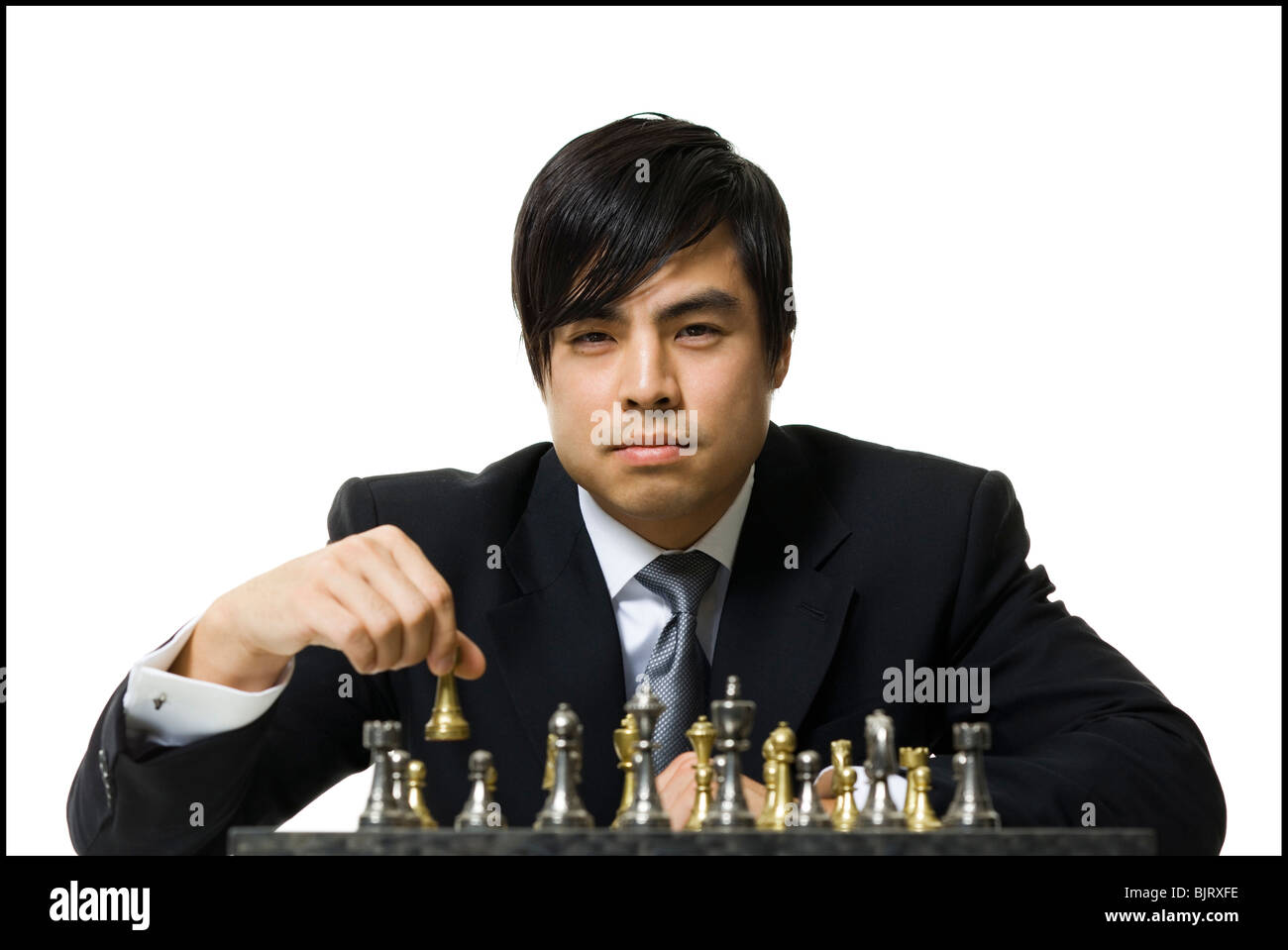 Man playing chess Stock Photo - Alamy