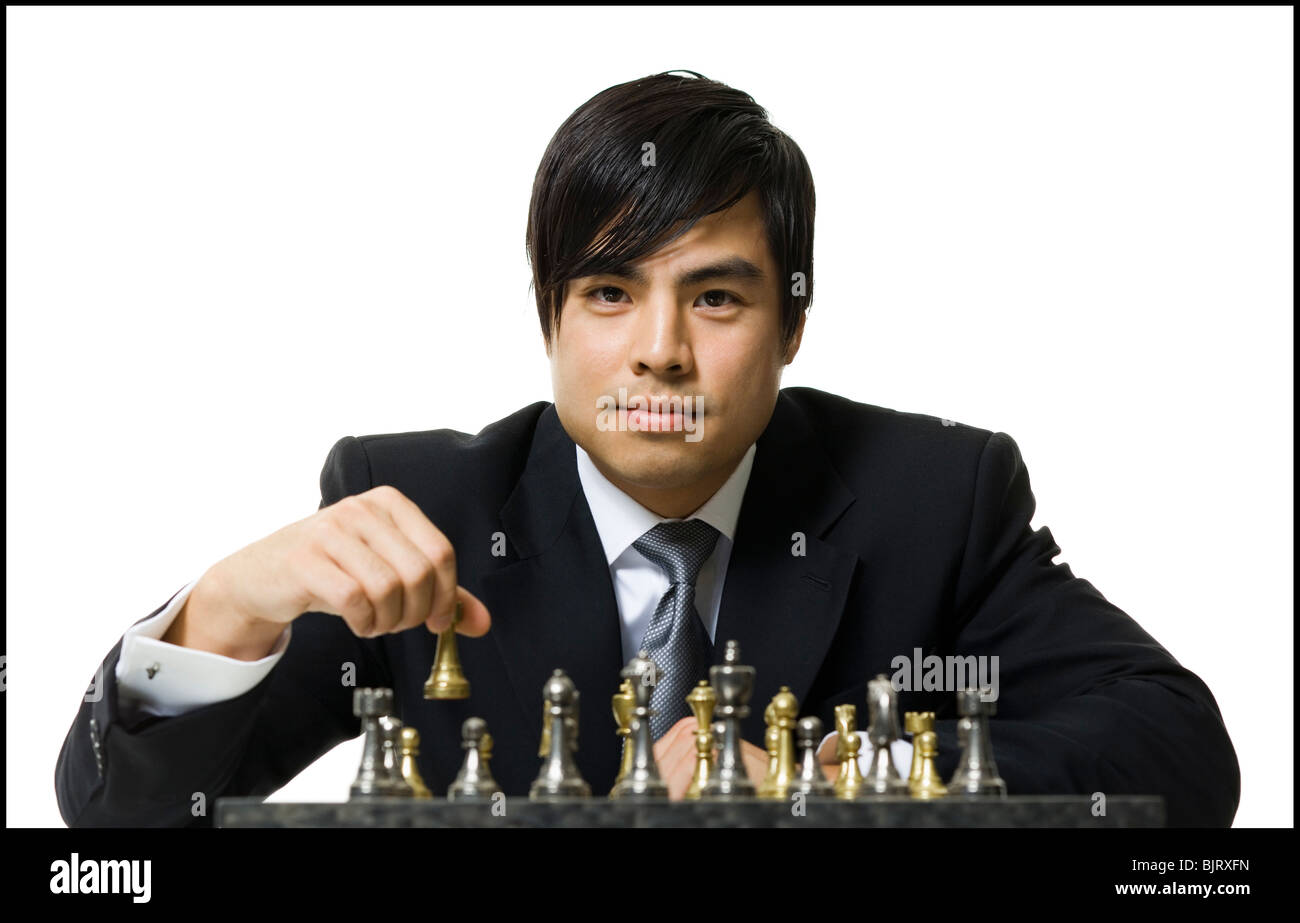 Man playing chess Stock Photo - Alamy