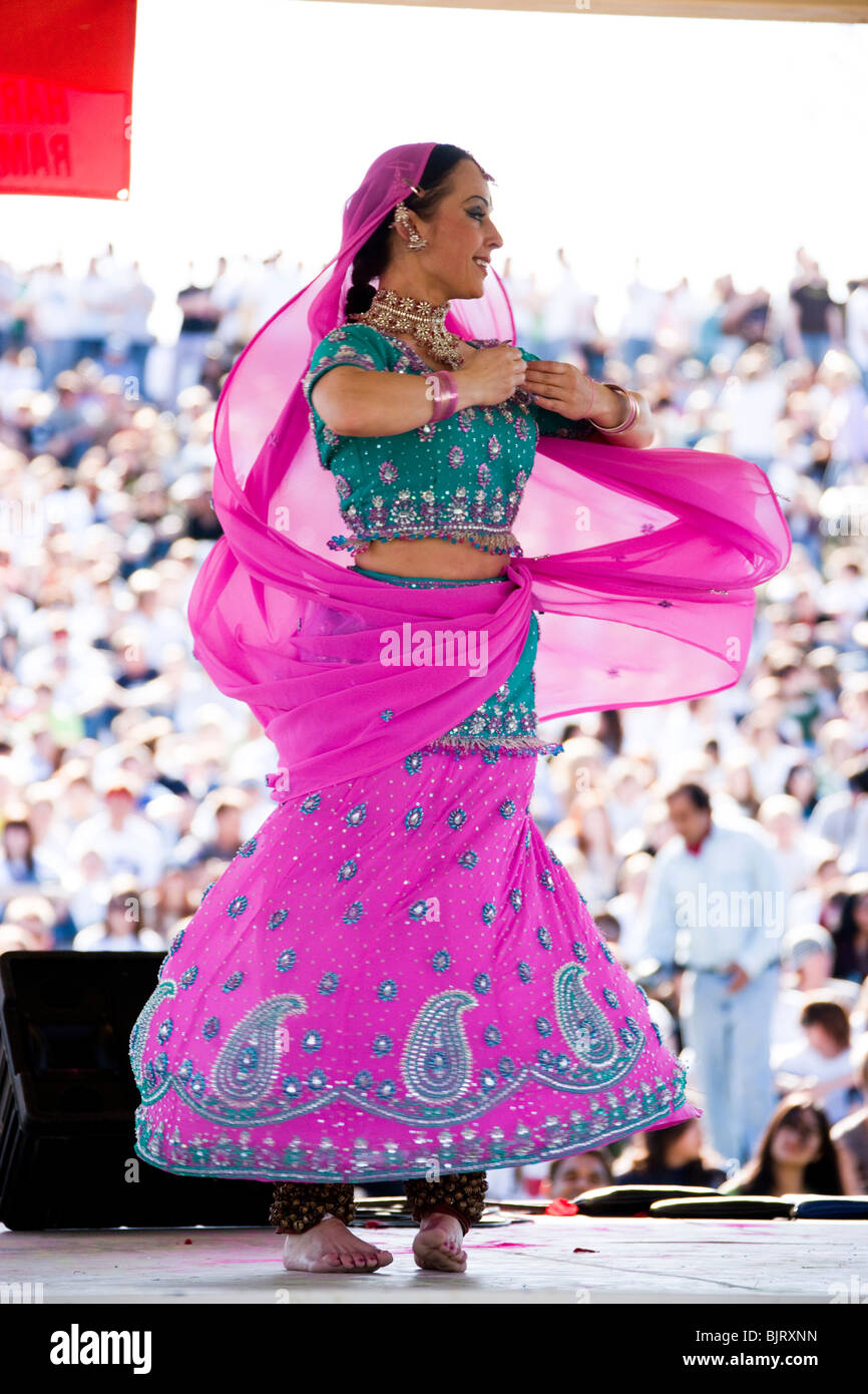 USA, Utah, Spanish Fork, mid adult dancer in traditional clothing ...