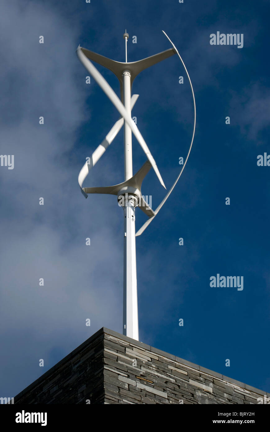 Modern windmill (wind generator) on the roof of the new visitors centre ...