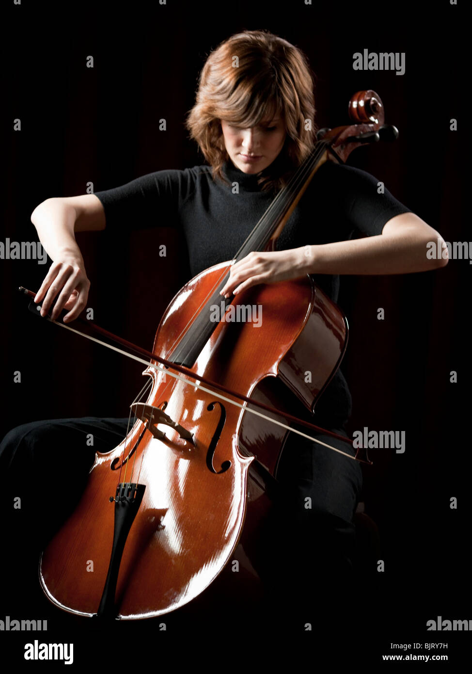 Woman playing cello hi-res stock photography and images - Alamy