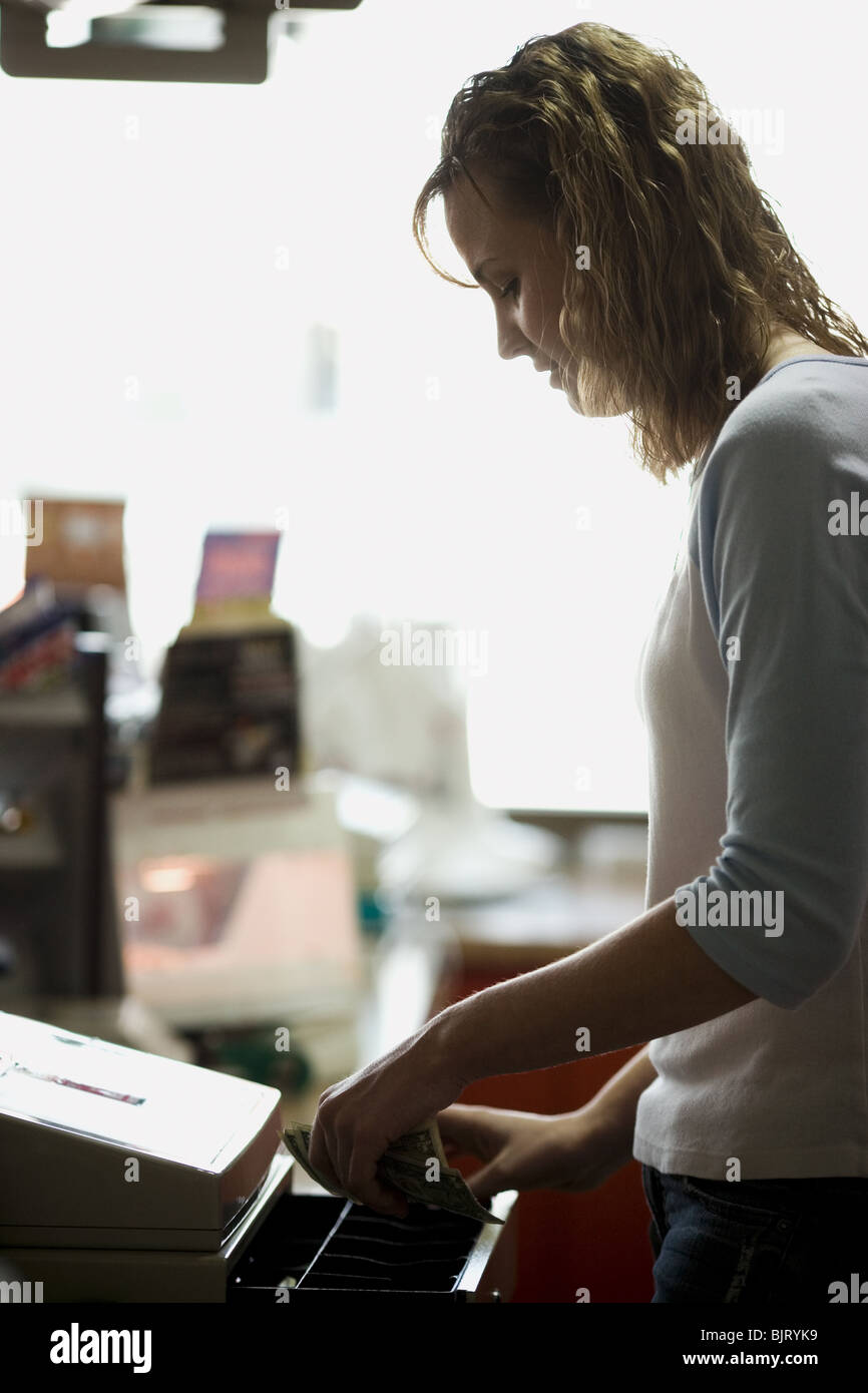 Female clerk in retail store Stock Photo - Alamy