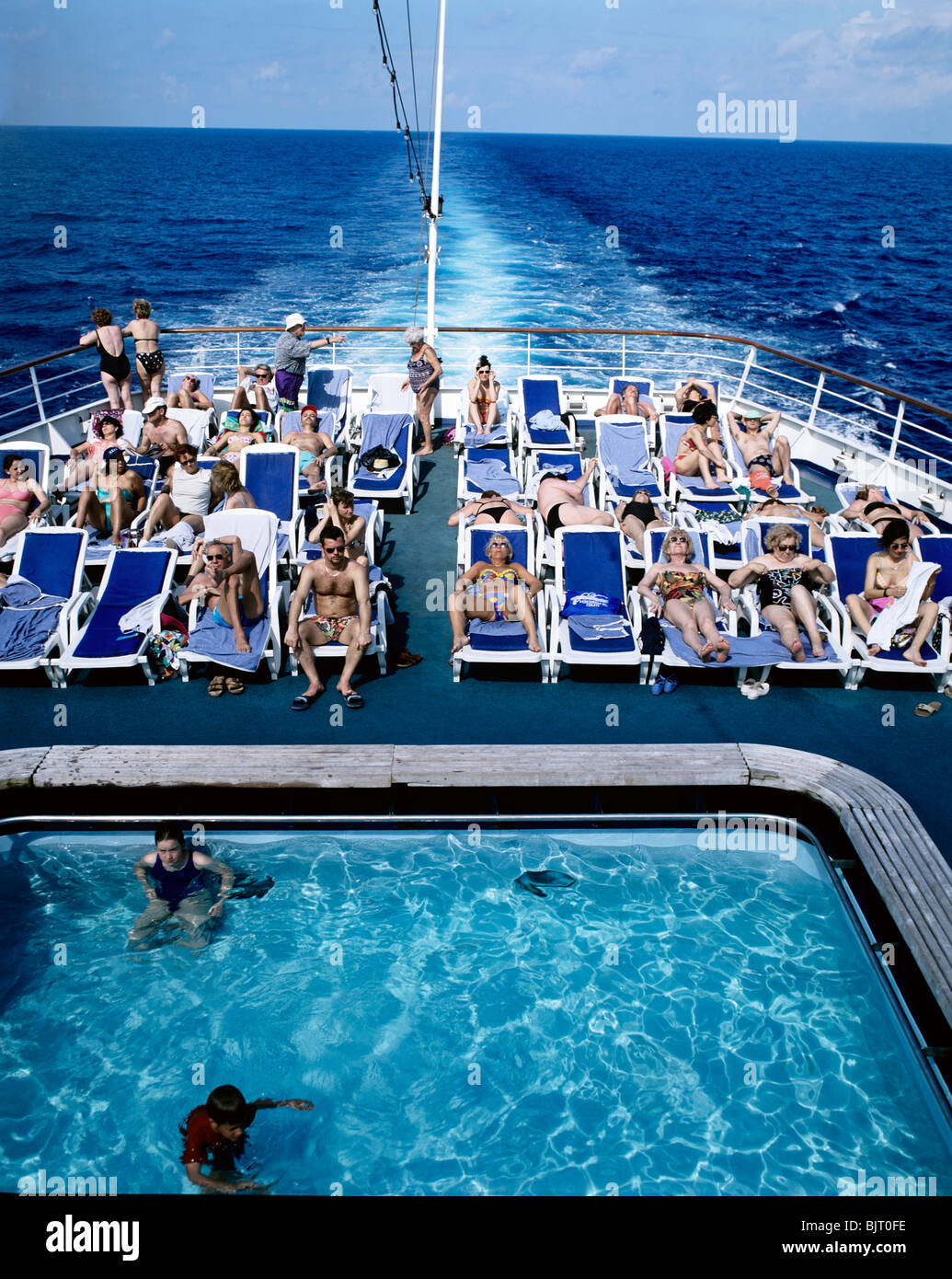 Mexico, on board cruise ship with swimming pool and sunbathing Stock ...
