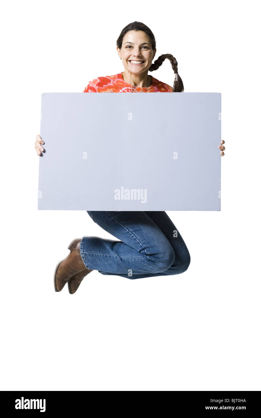 Person holding sign th Cut Out Stock Images & Pictures - Alamy