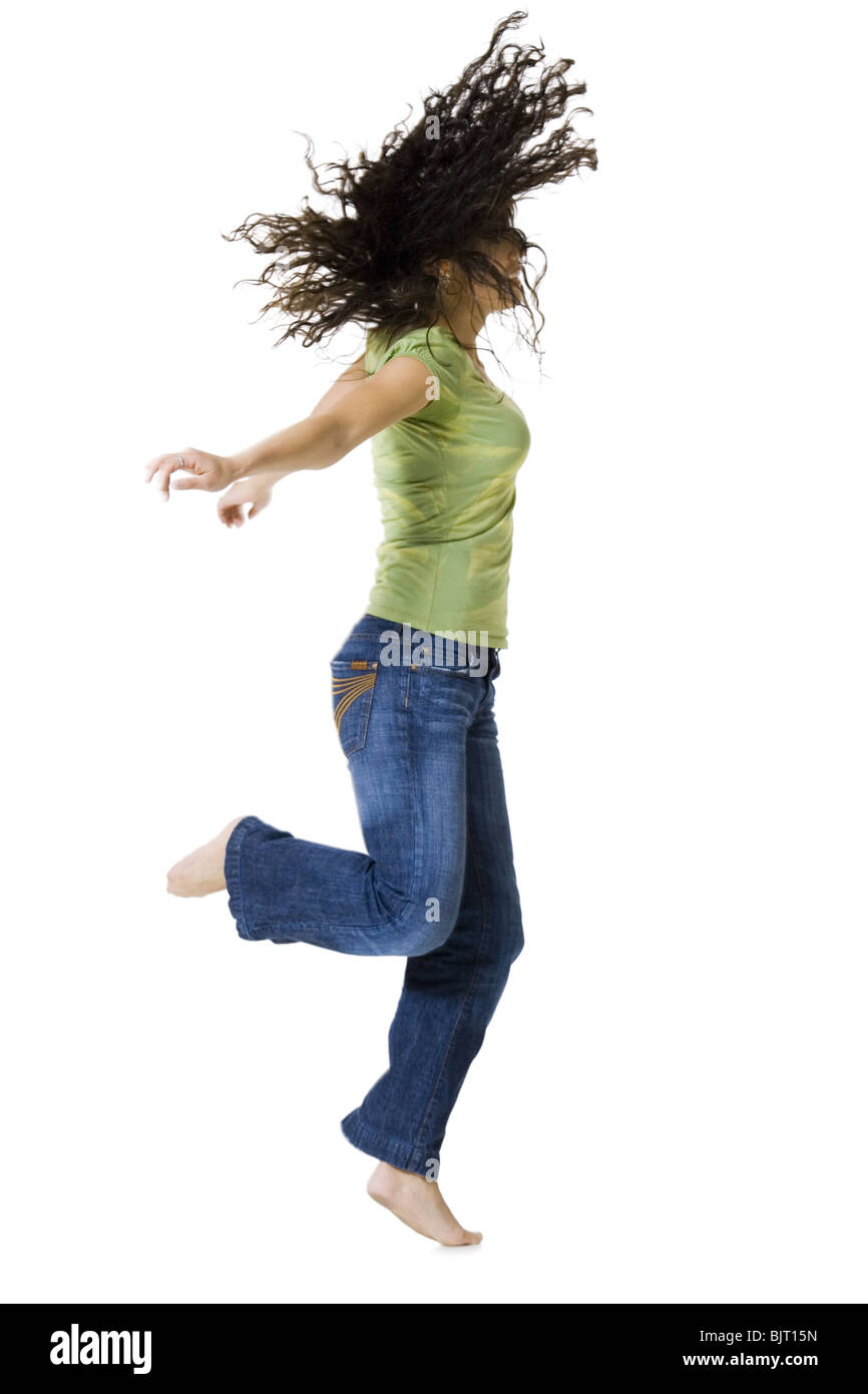 Woman dancing and shaking her hair Stock Photo - Alamy