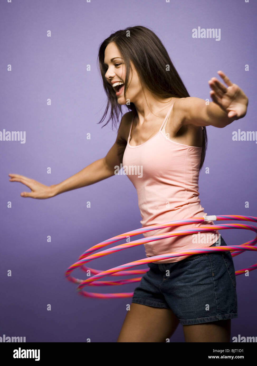 Woman dancing with hoops hi-res stock photography and images - Alamy