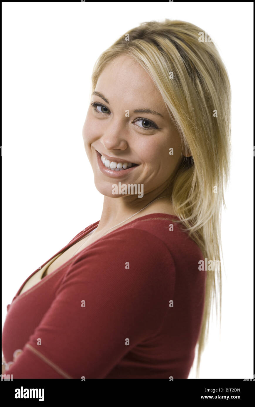 Woman smiling and posing Stock Photo - Alamy
