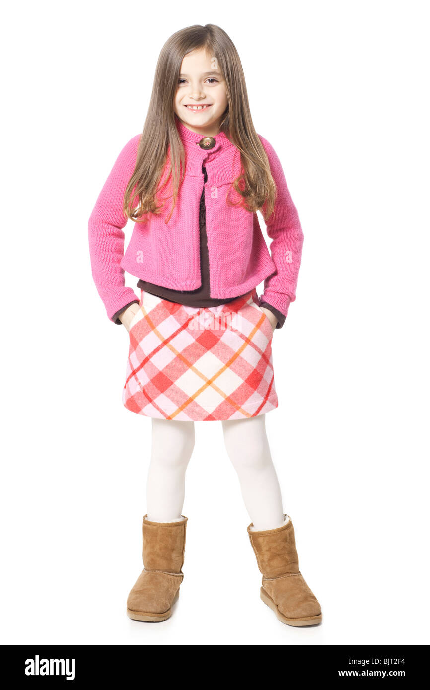 Studio portrait of girl (8-9) smiling Stock Photo - Alamy