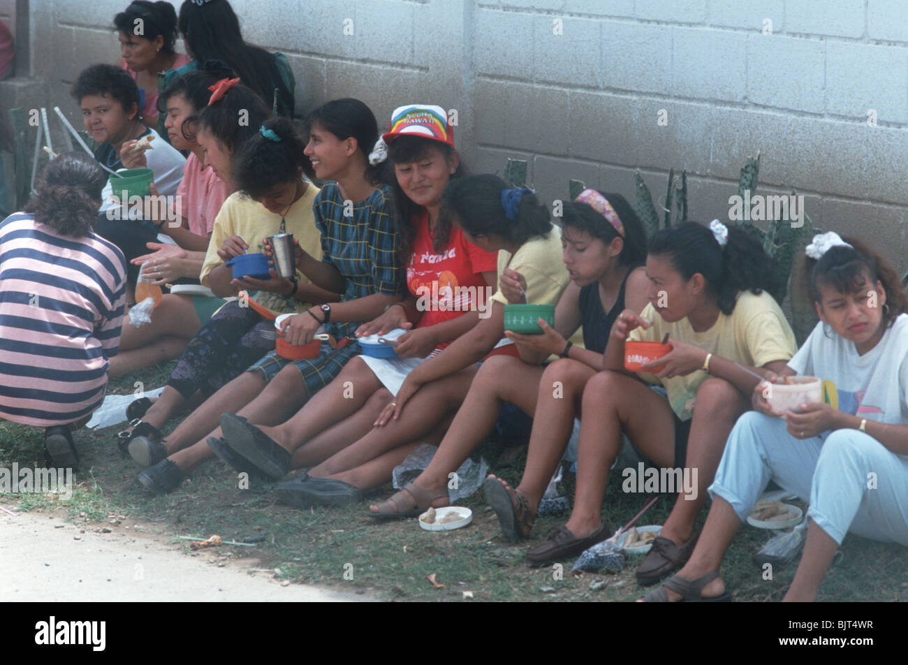 HONDURAS WOMEN WORKERS AT MAQUILA TEXTILE FACTORY ON LUNCH BREAK IN SAN ...