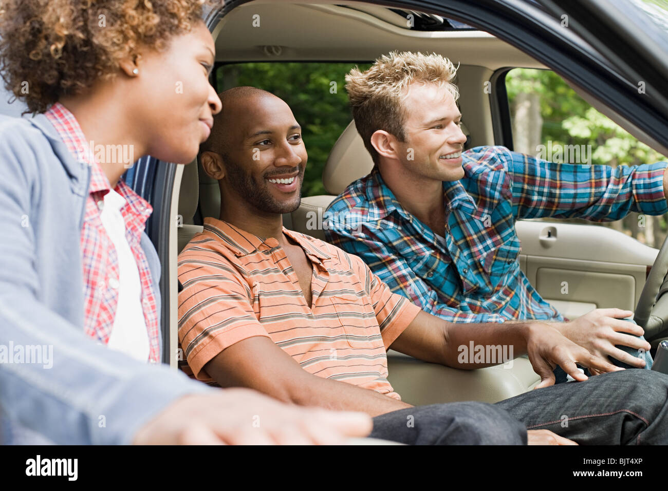 Friends and car Stock Photo - Alamy
