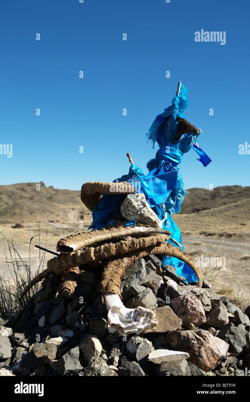 Ovoo is a shamanistic cairn (pile of stones). Gobi Desert, Mongolia ...
