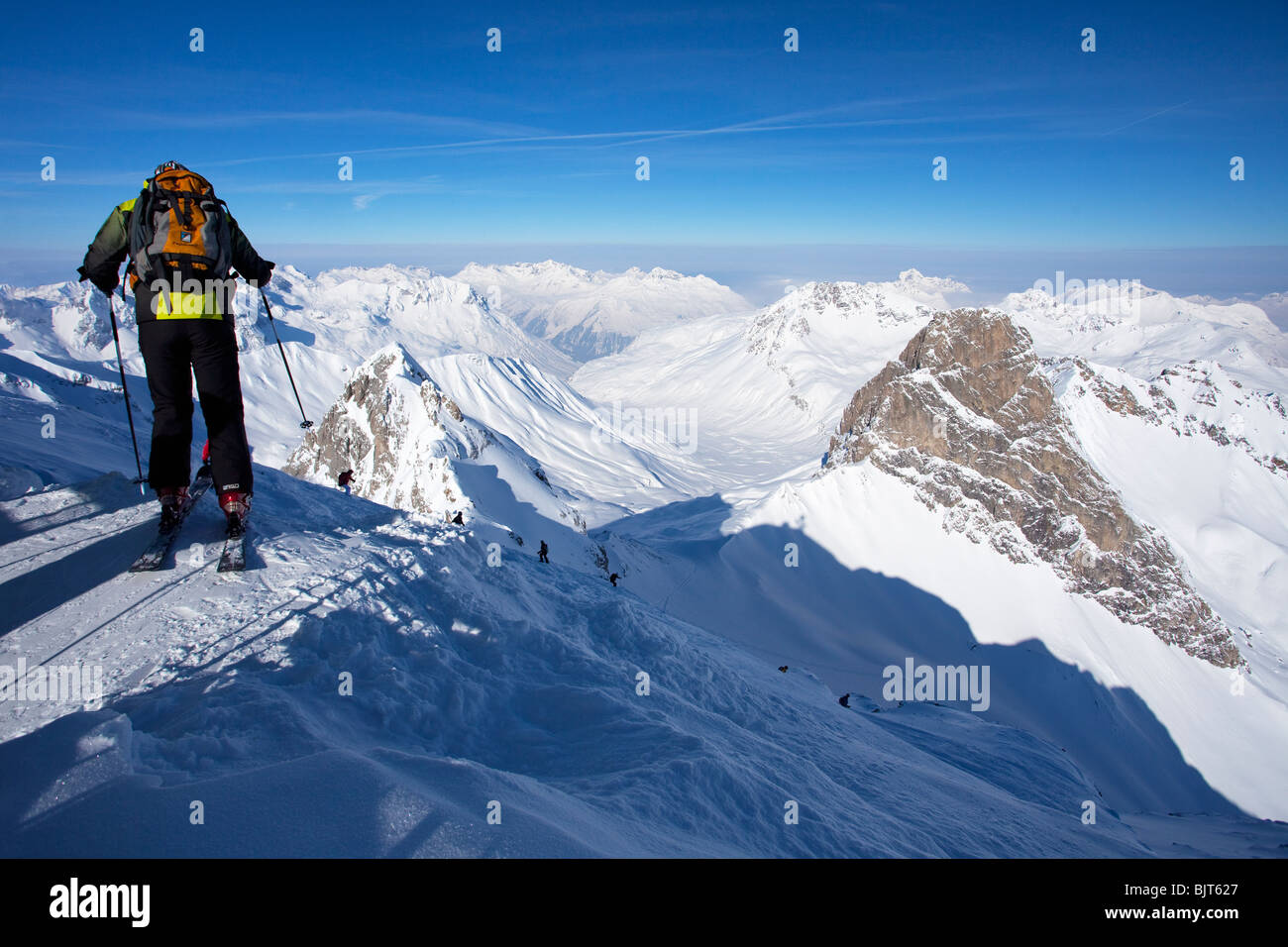Skiing off-piste from summit of Valluga in St Saint Anton am Arlberg in ...