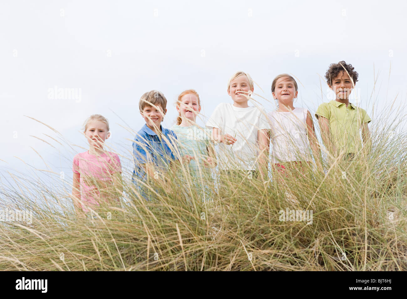 Portrait of friends in a row Stock Photo - Alamy